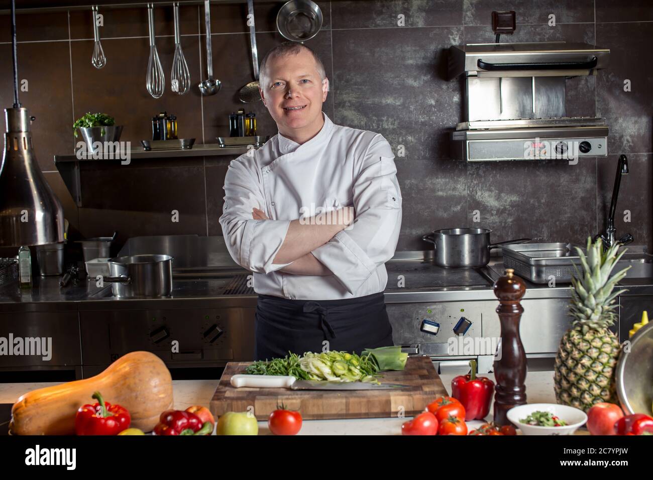 Chef in hotel or restaurant kitchen Stock Photo - Alamy