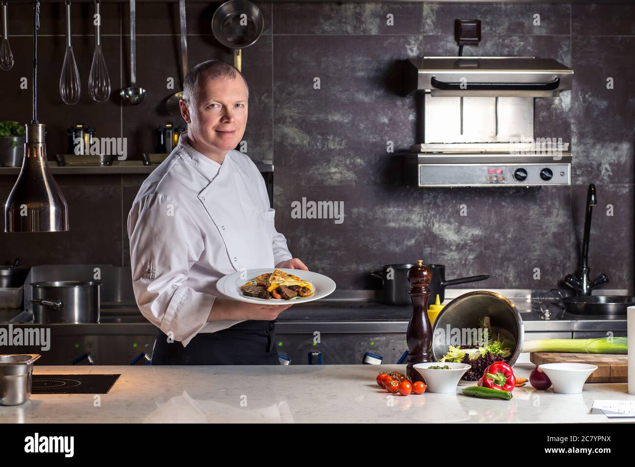 Handsome Man Leaning On Counter High Resolution Stock Photography and ...