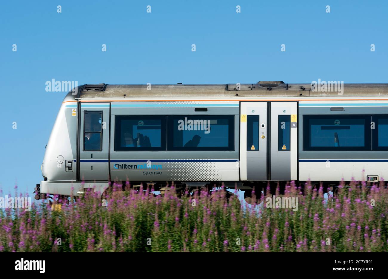 Chiltern Railways class 168 diesel train, side view with lineside ...
