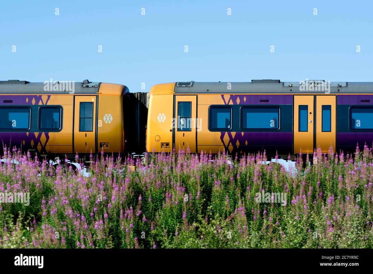 West Midlands Railway class 172 diesel train, side view with lineside ...