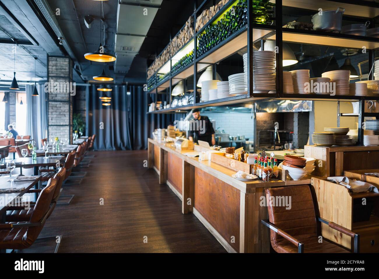 modern loft style restaurant decoration with hanging light bulb beer ...