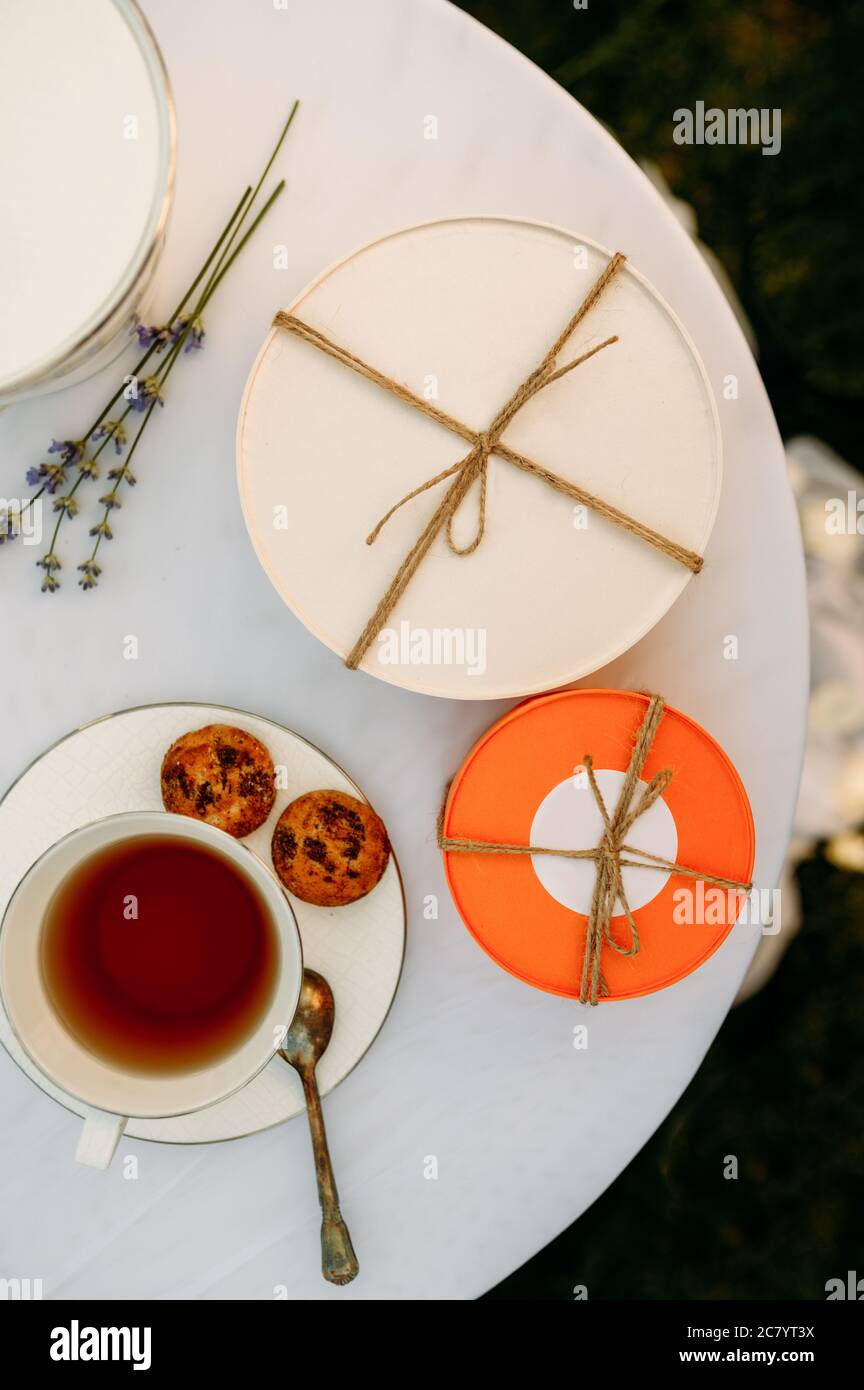 Table setting, tea party with sweets, top view Stock Photo - Alamy