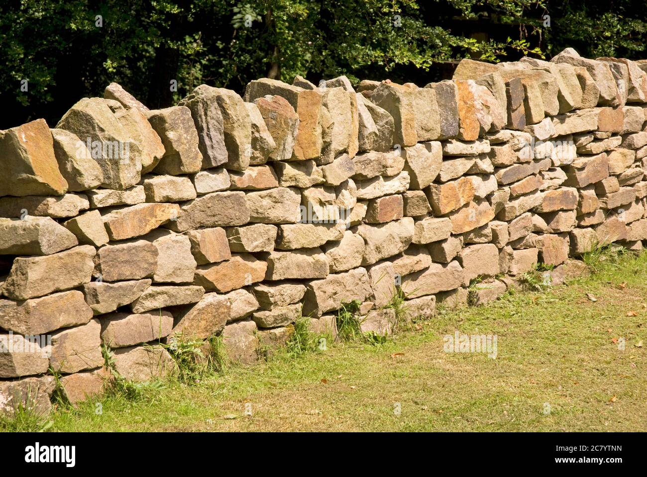 Dry stone wall example on display Stock Photo - Alamy