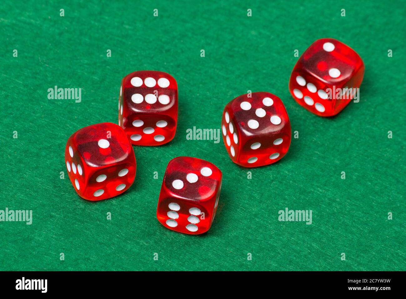 Five rolling red dices hi-res stock photography and images - Alamy