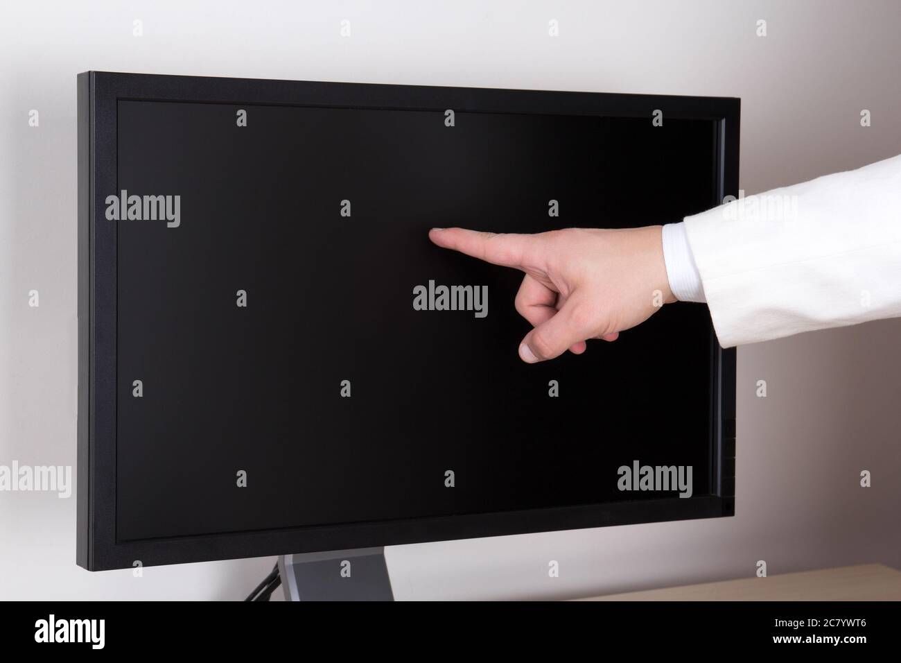 male hand and big black flat touchscreen Stock Photo - Alamy