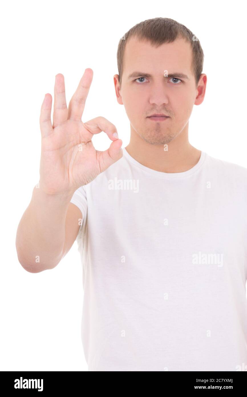 portrait of young attractive man showing okay sign isolated on white ...