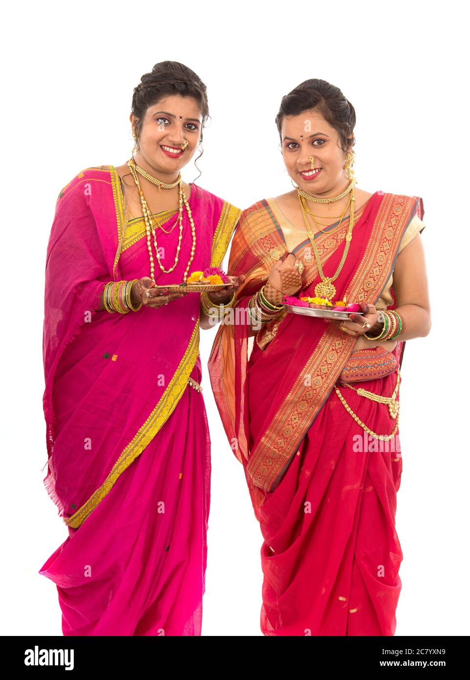 Portrait of Indian Traditional Girls holding diya and flower thali ...
