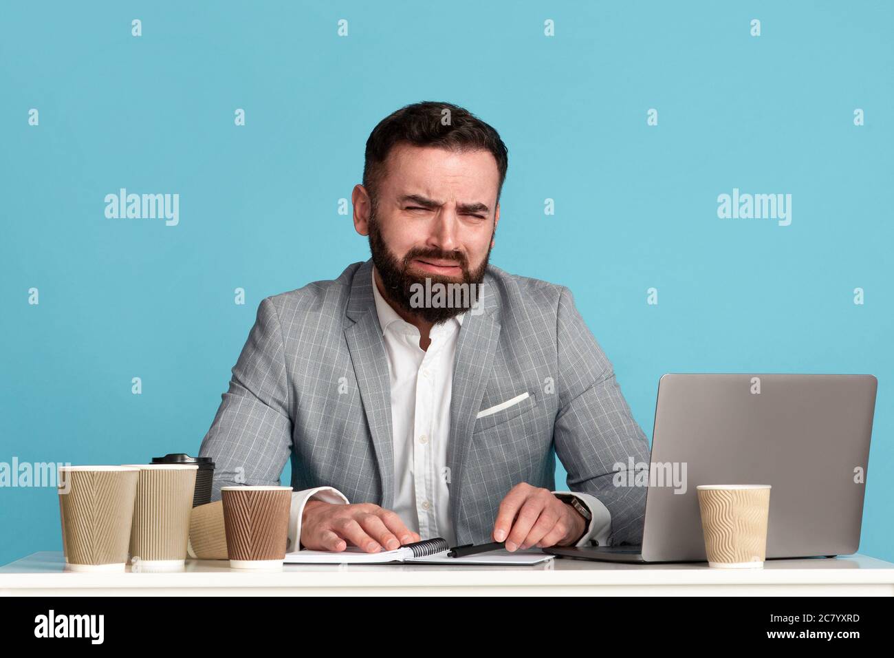 Millennial office employee whining or crying at desk because of too ...