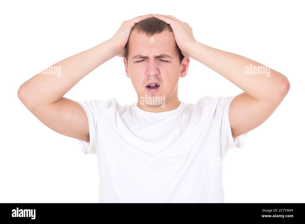 tired young man isolated on white background Stock Photo - Alamy