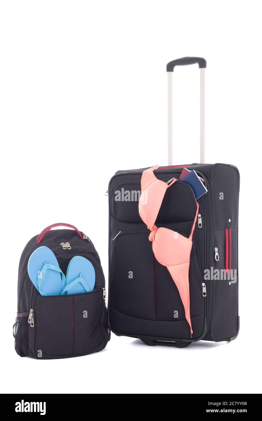 travel suitcase and backpack isolated on white background Stock Photo ...