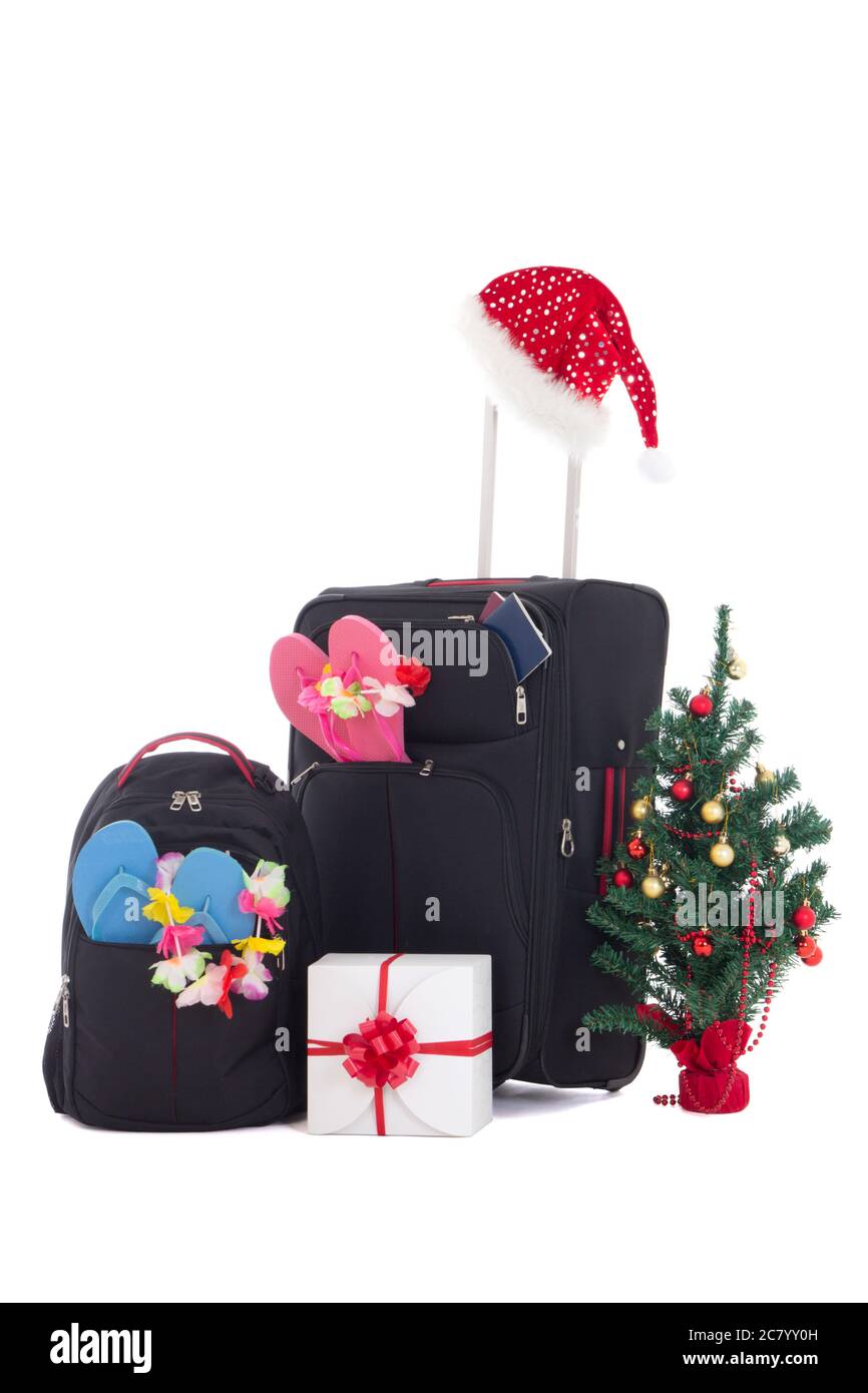 christmas trip - suitcase and packpack, giftbox and christmas tree ...