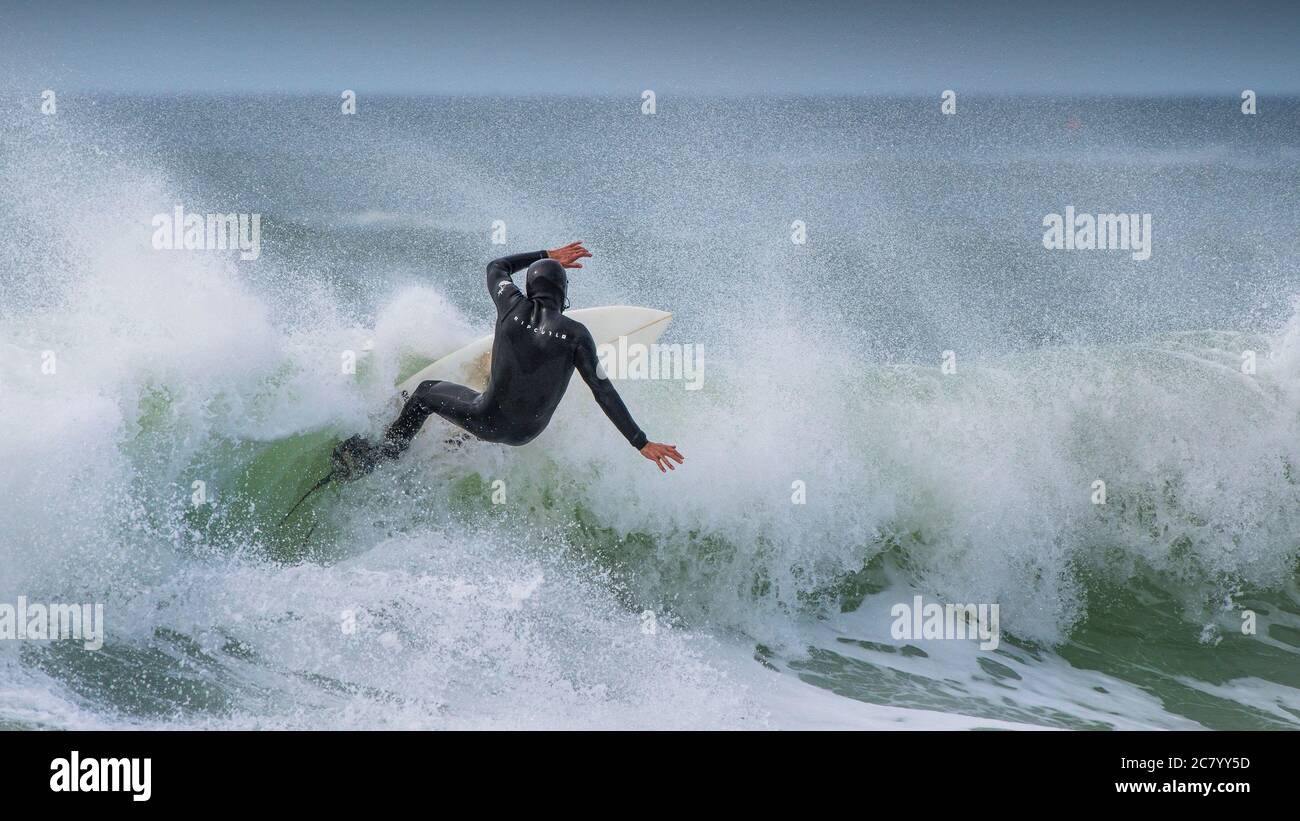 A panoramic image of wild spectacular surfing action at Fistral in ...