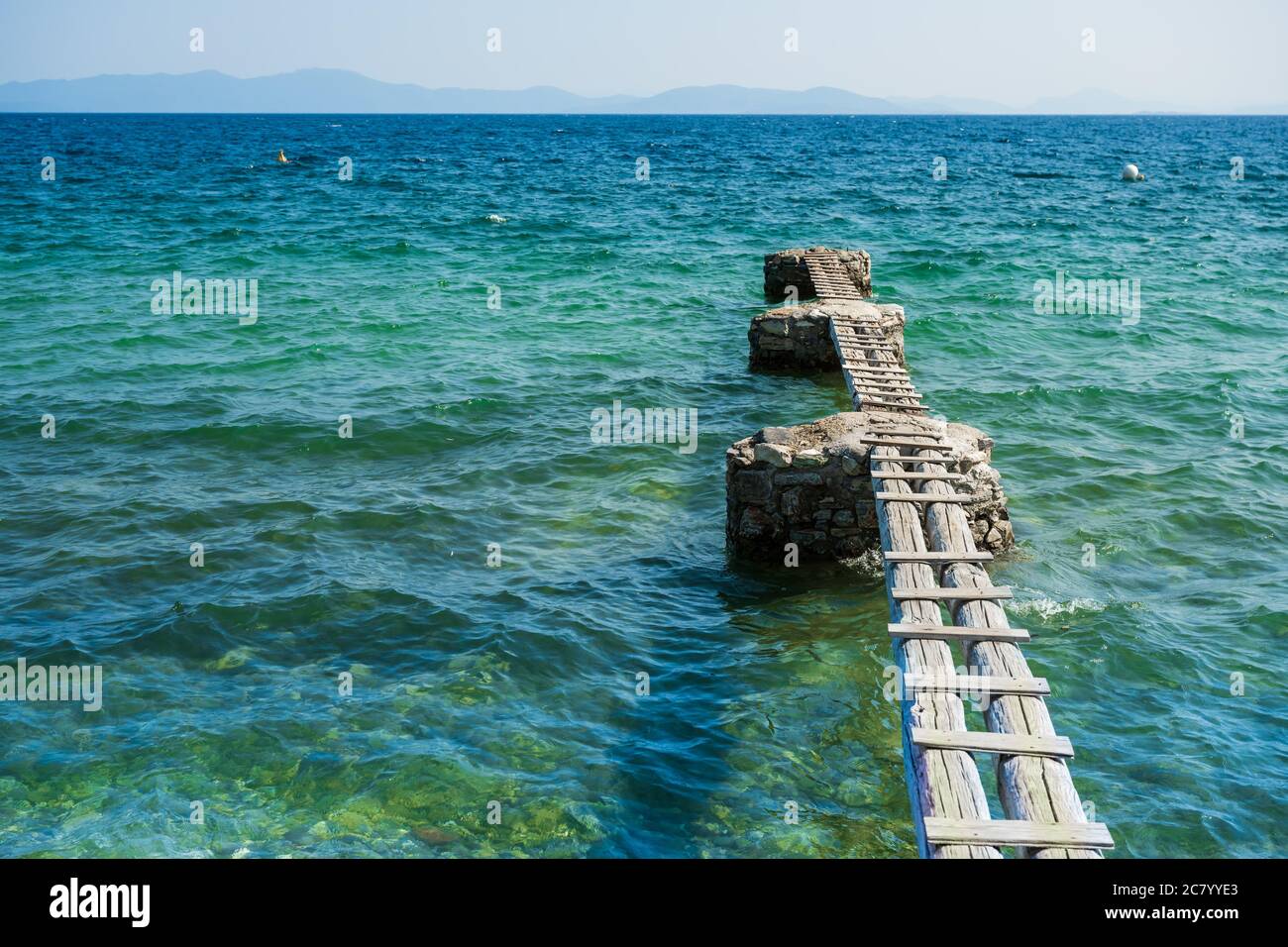 Wooden jetty in the morning with sun hi-res stock photography and ...