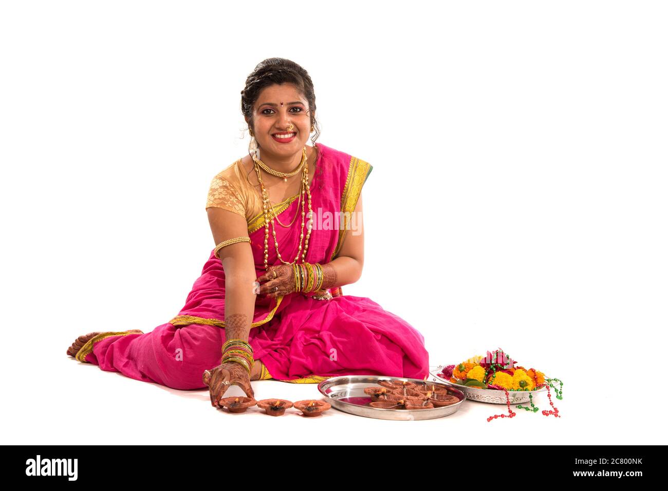 Portrait of a Indian Traditional Girl holding diya, Diwali or deepavali ...
