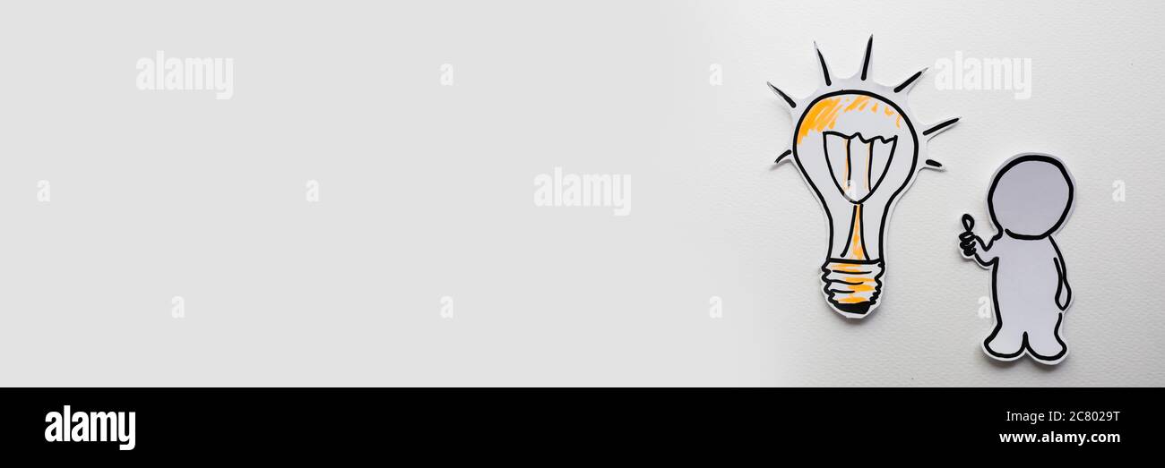 Paper human icon with bulb on white Stock Photo - Alamy