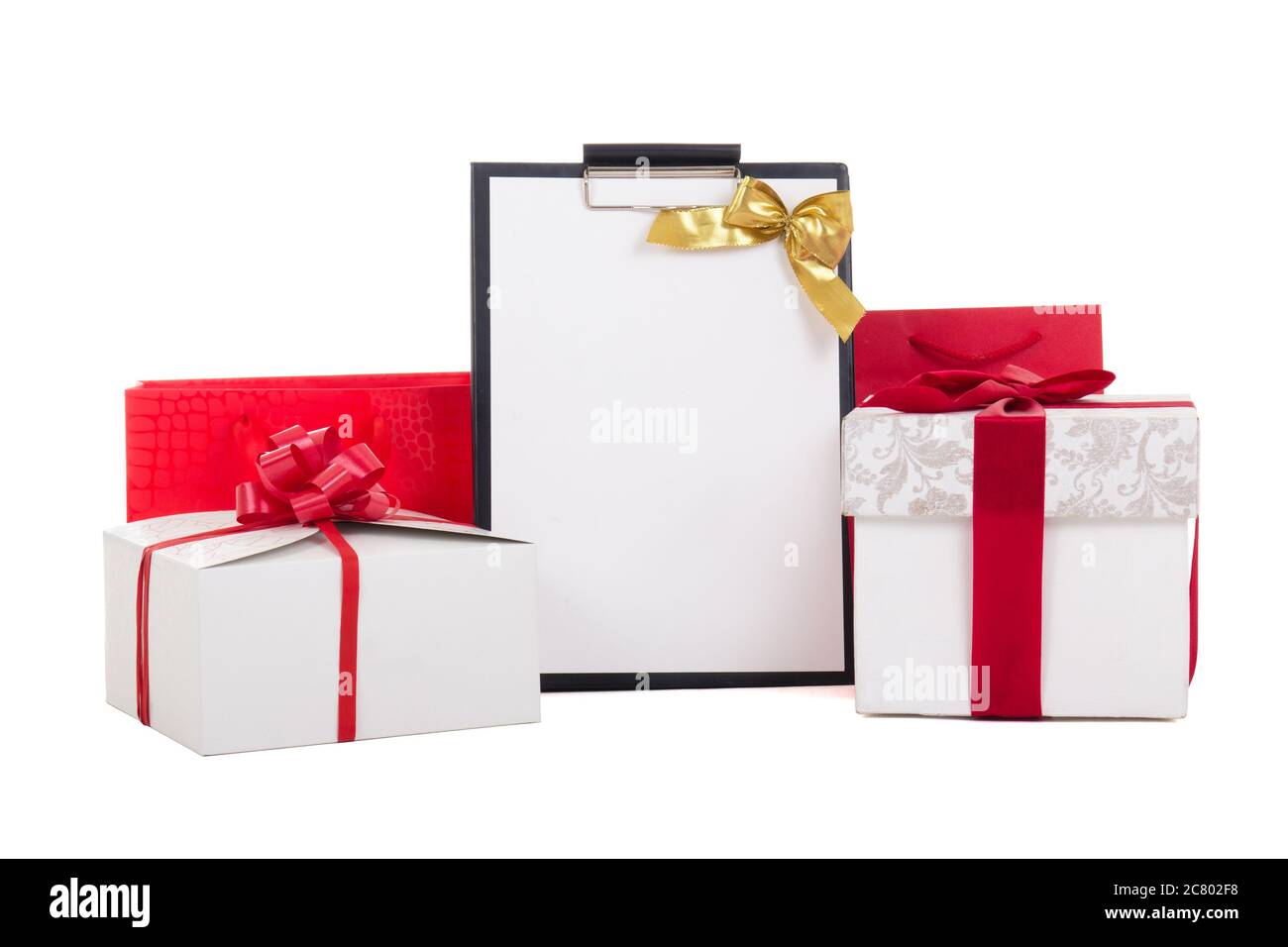 gift boxes with red ribbon and wish list isolated on white background ...