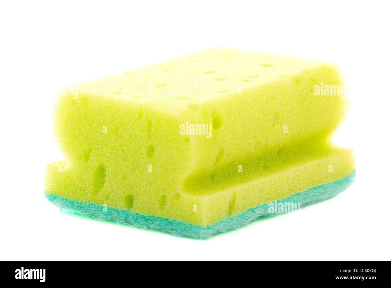 green cleaning sponge isolated on white background Stock Photo - Alamy