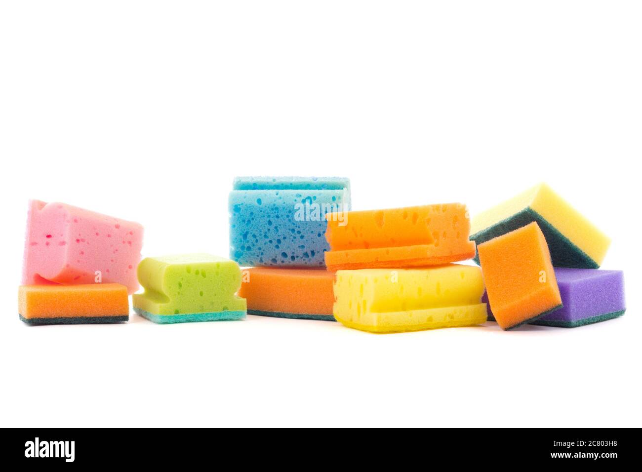 colorful cleaning sponges isolated on white background Stock Photo - Alamy