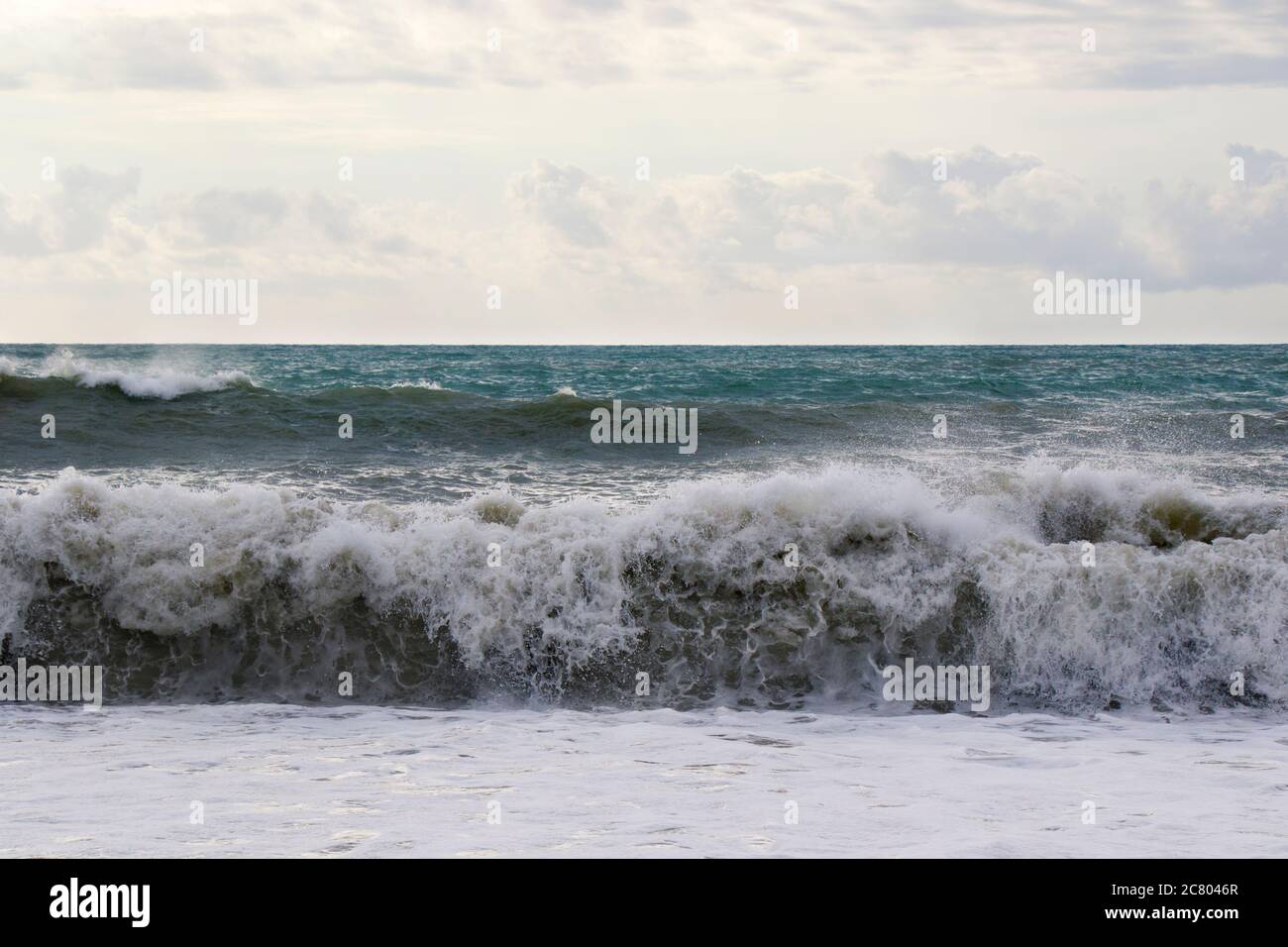 Stormy weather, waves and splashes in Batumi, Georgia. Stormy Black sea ...