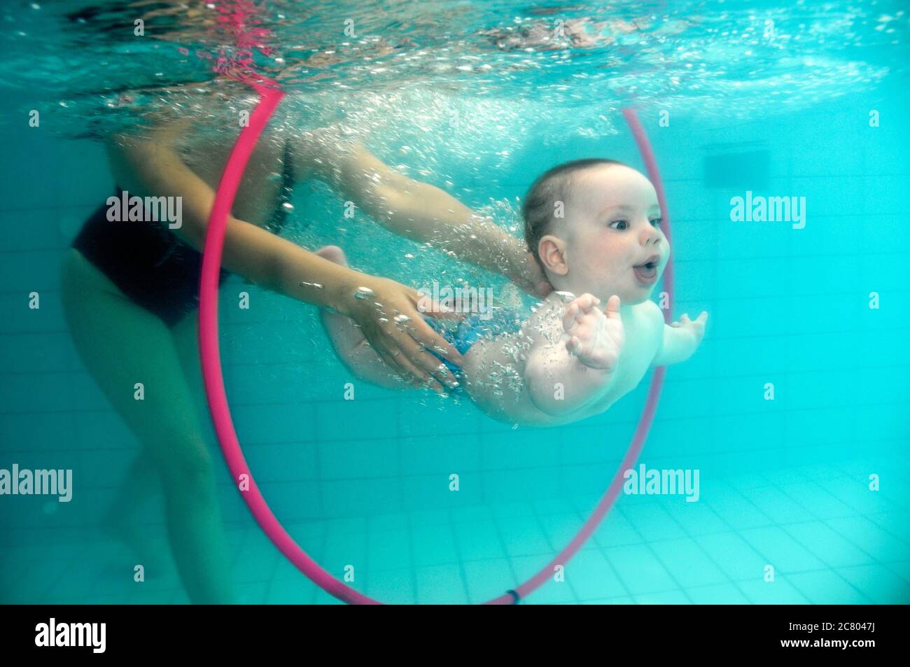 Mother and baby underwater hi-res stock photography and images - Alamy
