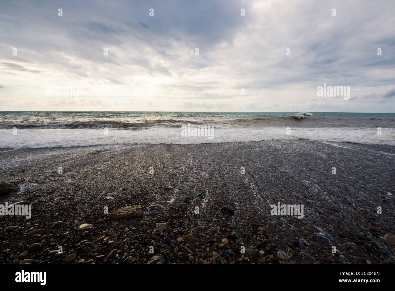 Stormy weather, waves and splashes in Batumi, Georgia. Stormy Black sea ...