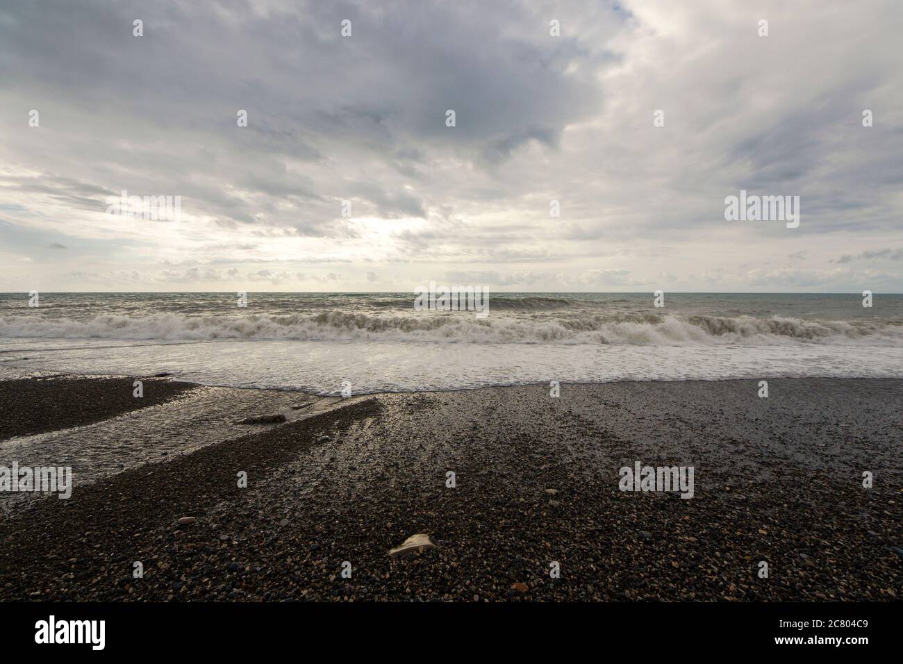 Stormy weather, waves and splashes in Batumi, Georgia. Stormy Black sea ...