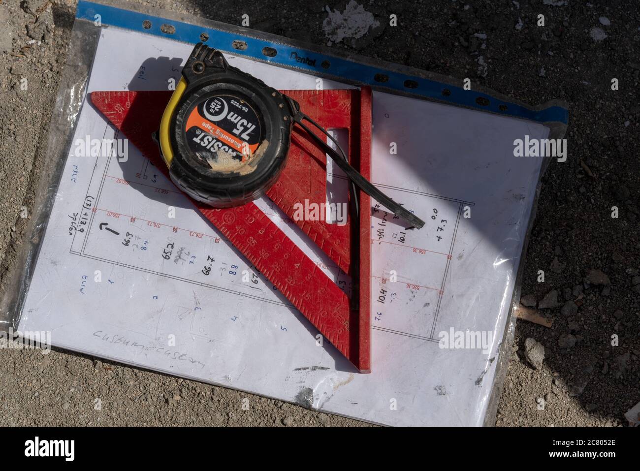 Carpentry measure, plan and design tools on raw wood background ...