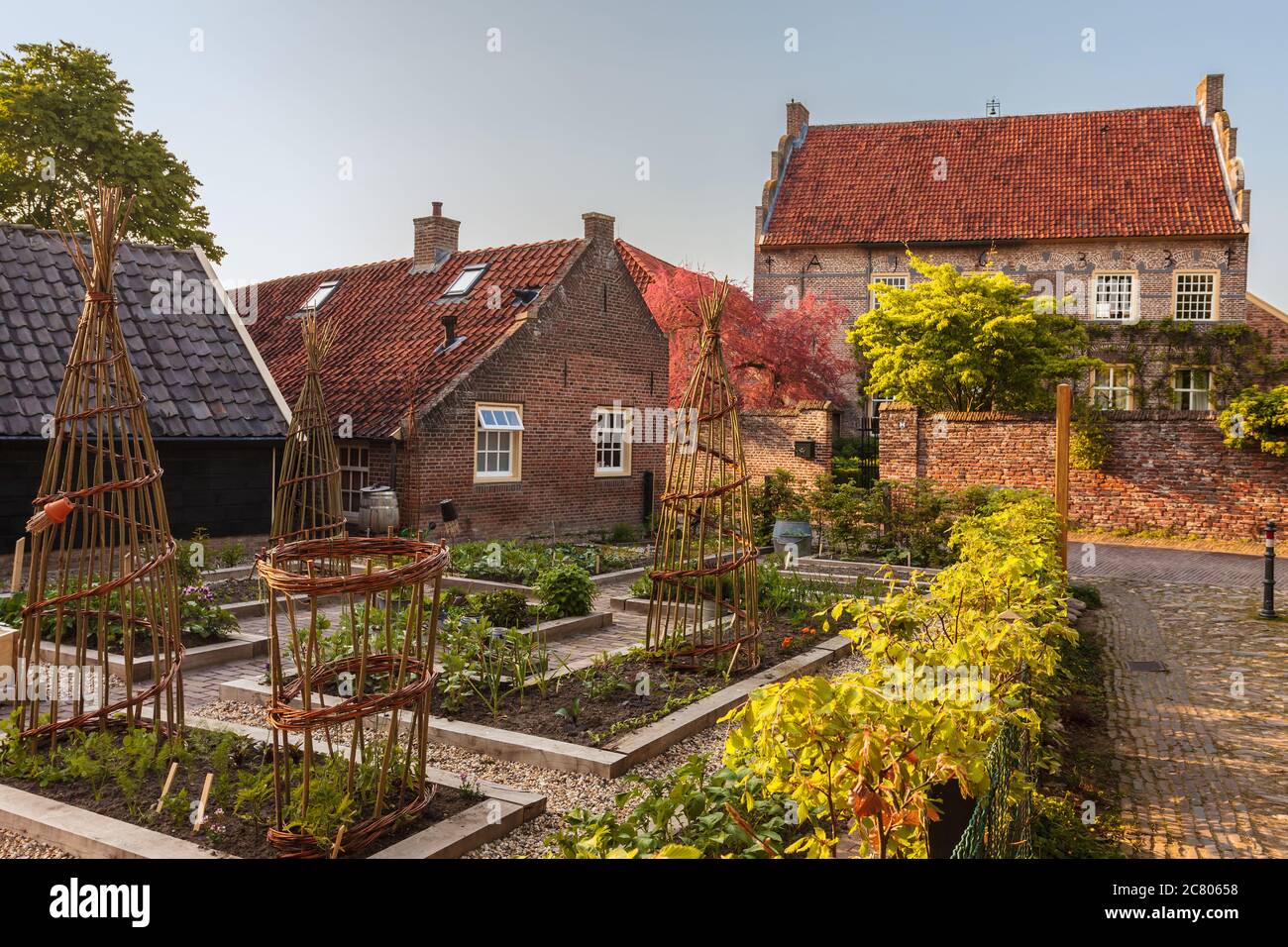 View at a vegetable garden in the medieval Dutch town Bronkhorst in ...