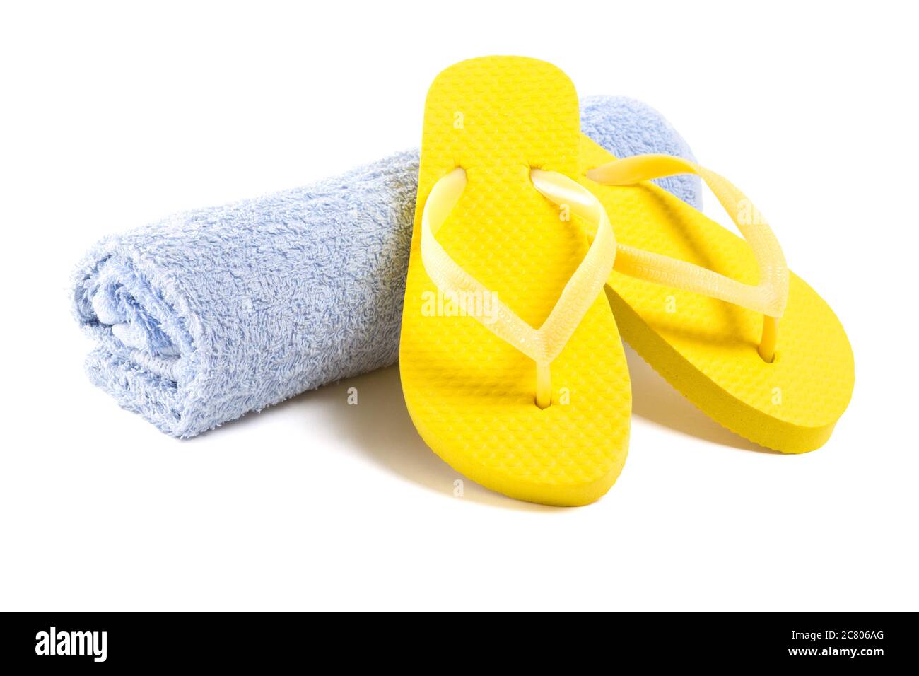 yellow flip flop shoes and towel isolated on white background Stock ...