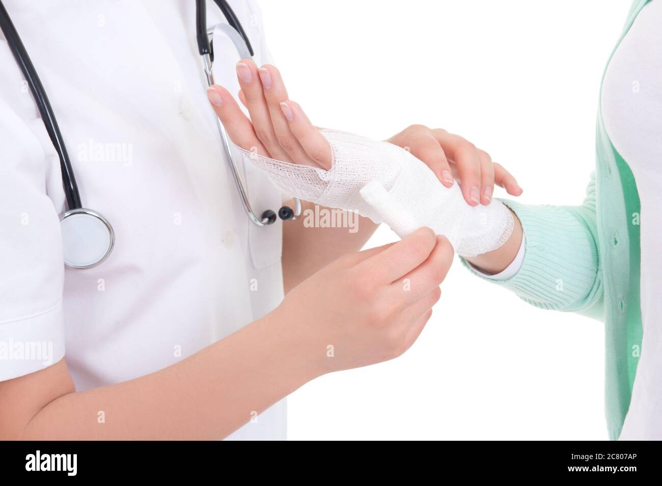 doctor bandaging female hand isolated on white background Stock Photo ...