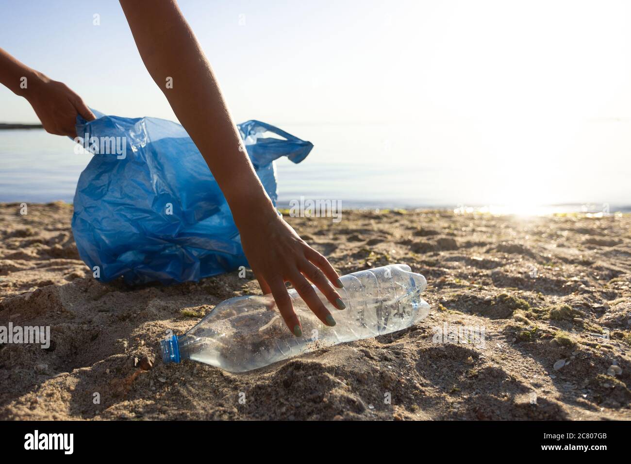Cleaning up plastic pollution water hi-res stock photography and images ...