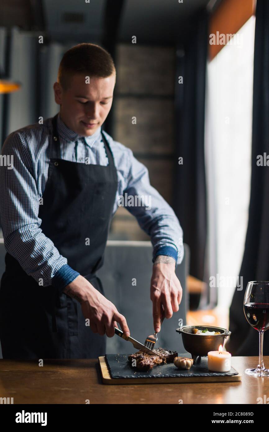 Man eating steak hi-res stock photography and images - Alamy