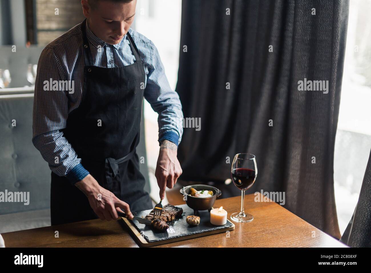Man eating steak hi-res stock photography and images - Alamy