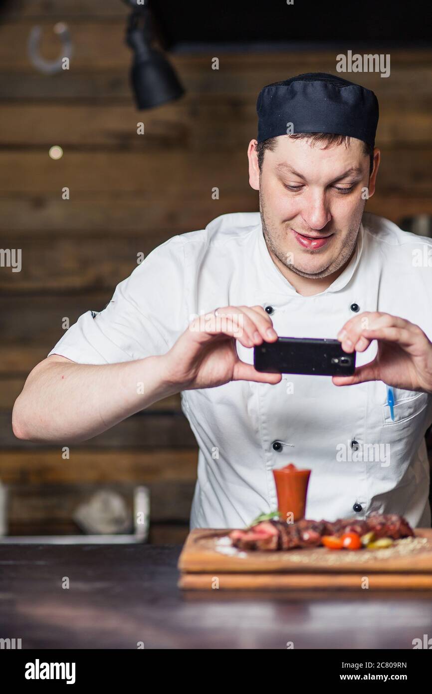 Chef touching food hi-res stock photography and images - Alamy