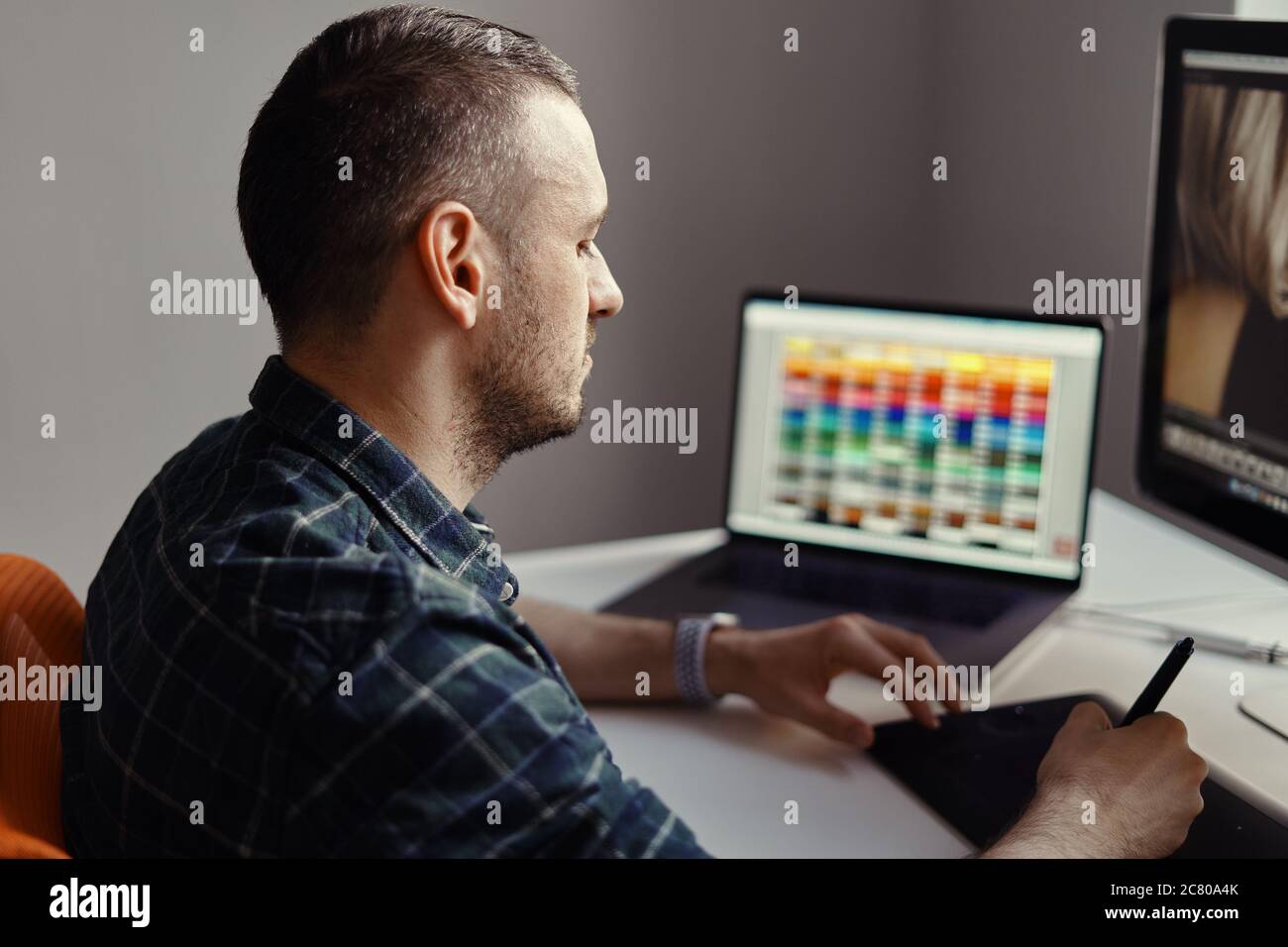 Handsome freelancer man working remotely from home. Young male working ...