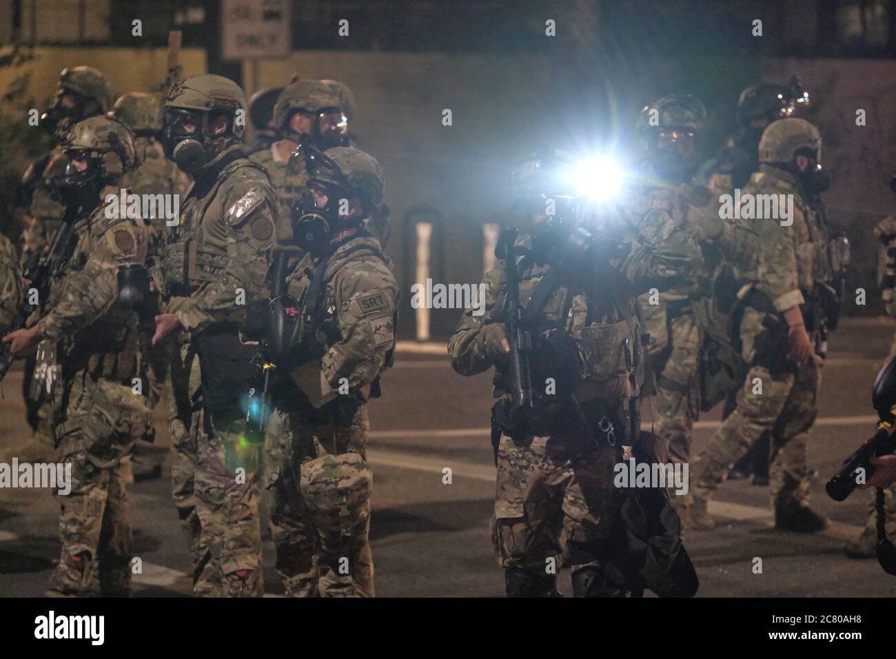 Portland, USA. 19th July, 2020. Federal officers line up near the Edith ...