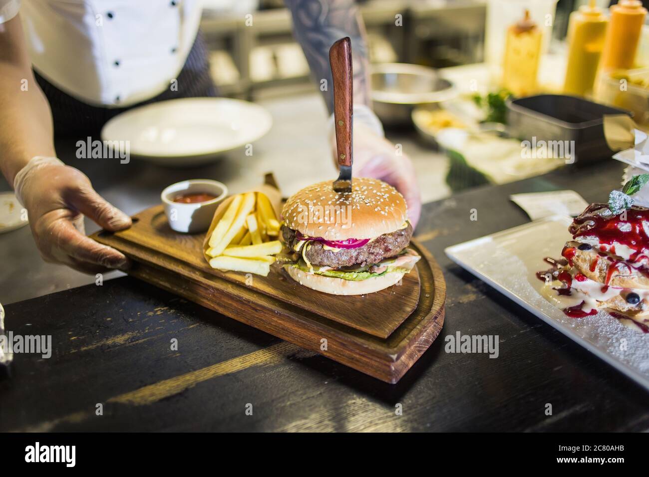 Two mouth-watering, delicious homemade burger used to chop beef. on the ...