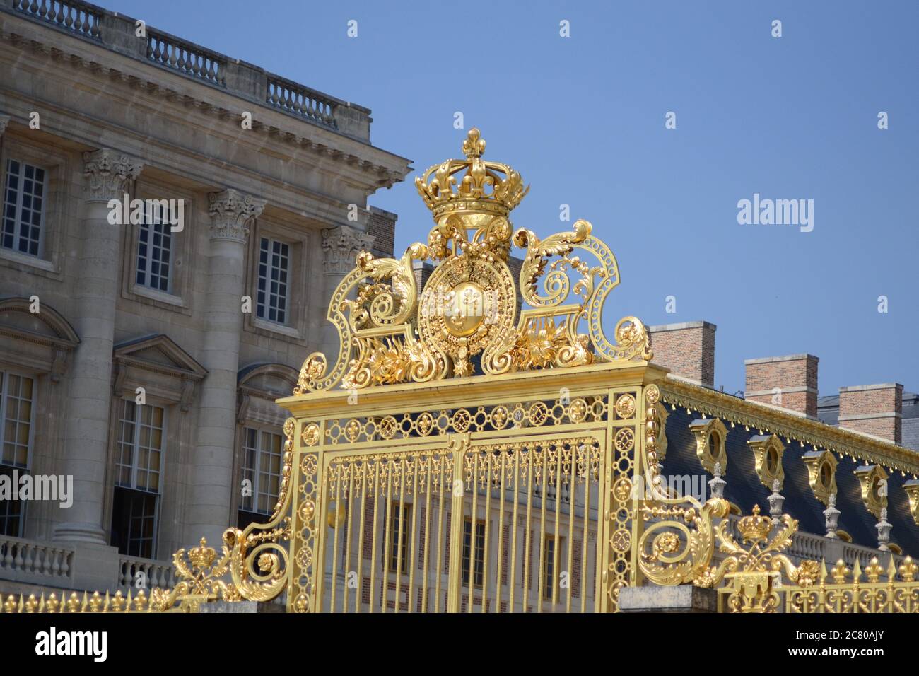 Beautiful shot of a golden gate of the Palace of Versailles in ...