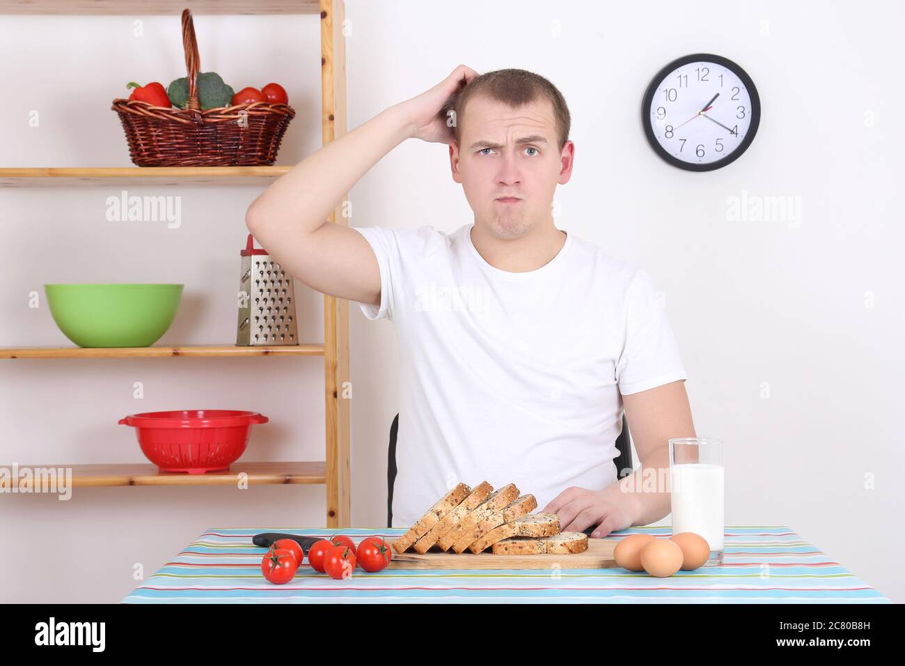 Portrait adult sad man cooking hi-res stock photography and images - Alamy