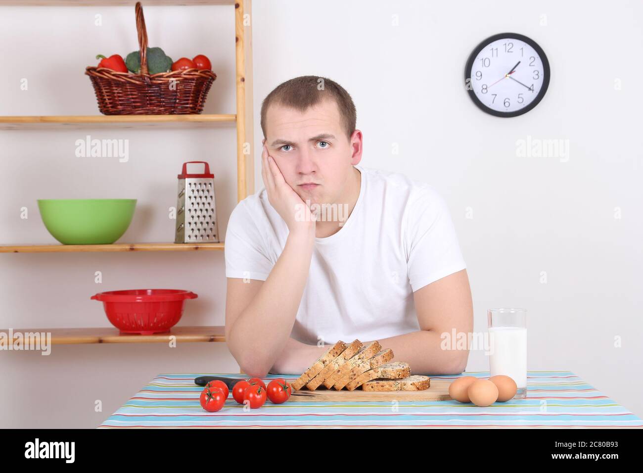 Portrait adult sad man cooking hi-res stock photography and images - Alamy