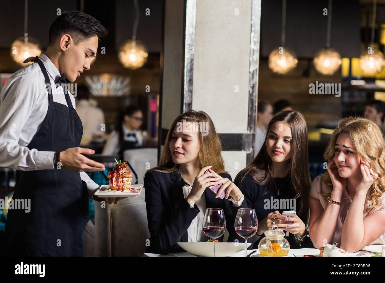 Close up woman eating menu restaurant hi-res stock photography and ...
