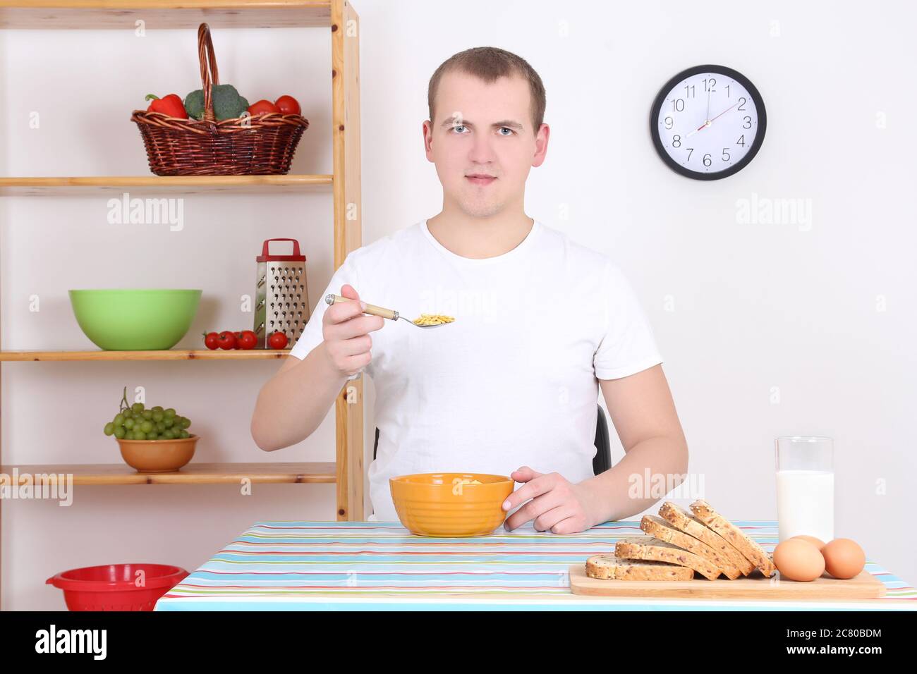 Man eating corn flakes hi-res stock photography and images - Alamy
