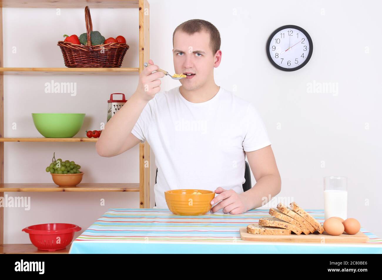 Man eating corn flakes hi-res stock photography and images - Alamy