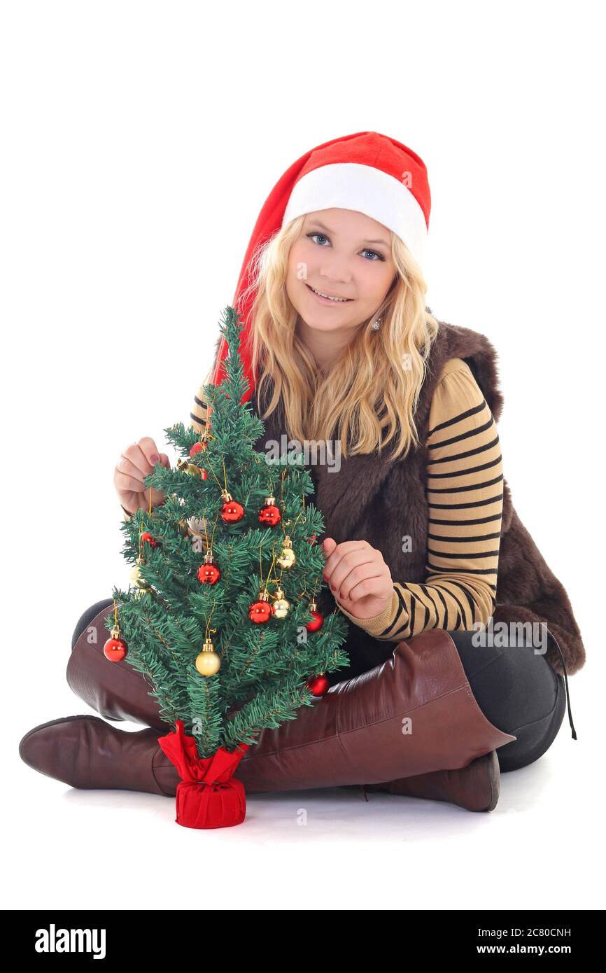 Woman with christmas tree isolated on white background Stock Photo - Alamy