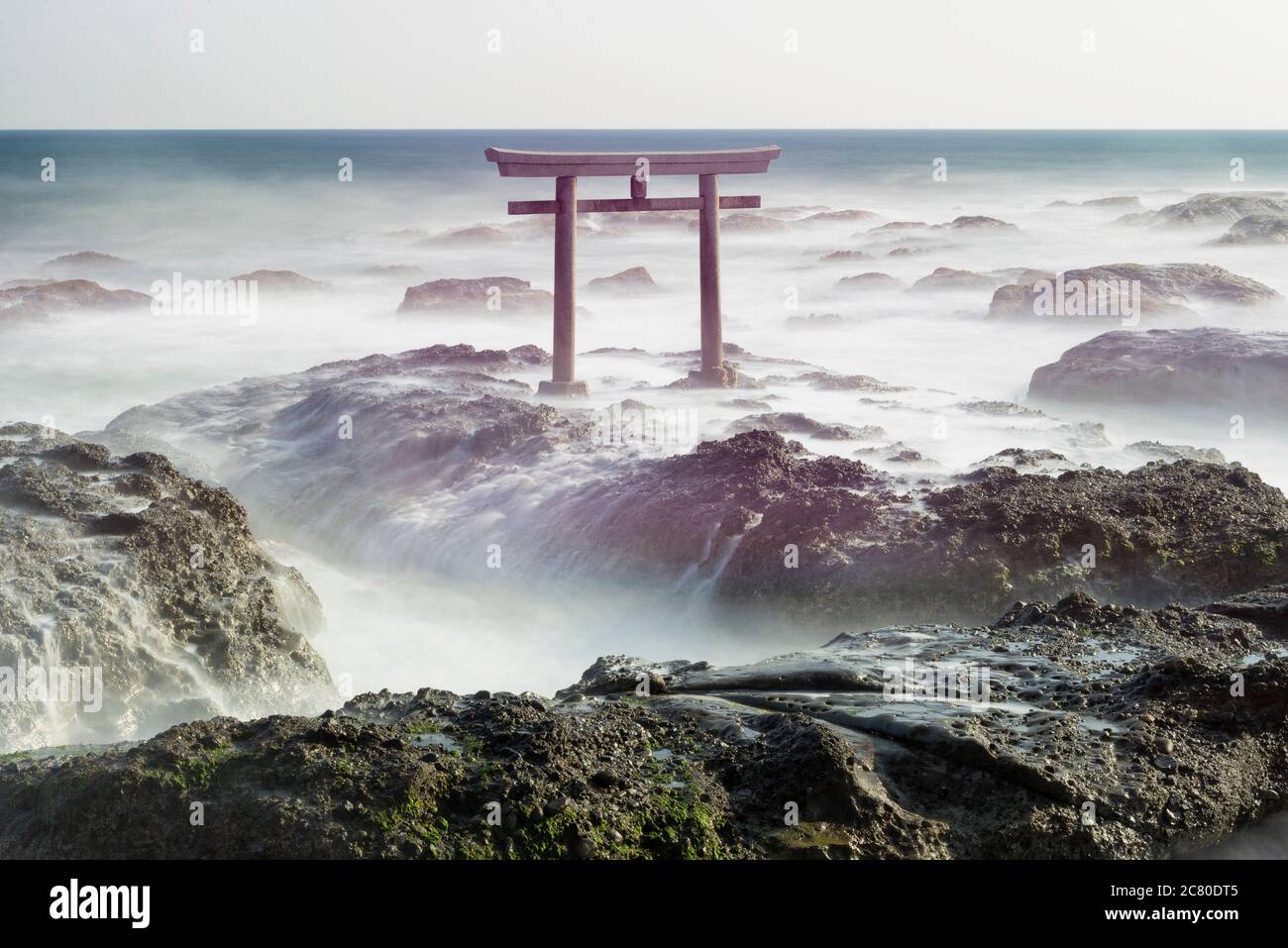 Tori Gate at the Sea with Gushing Waves Stock Photo - Alamy