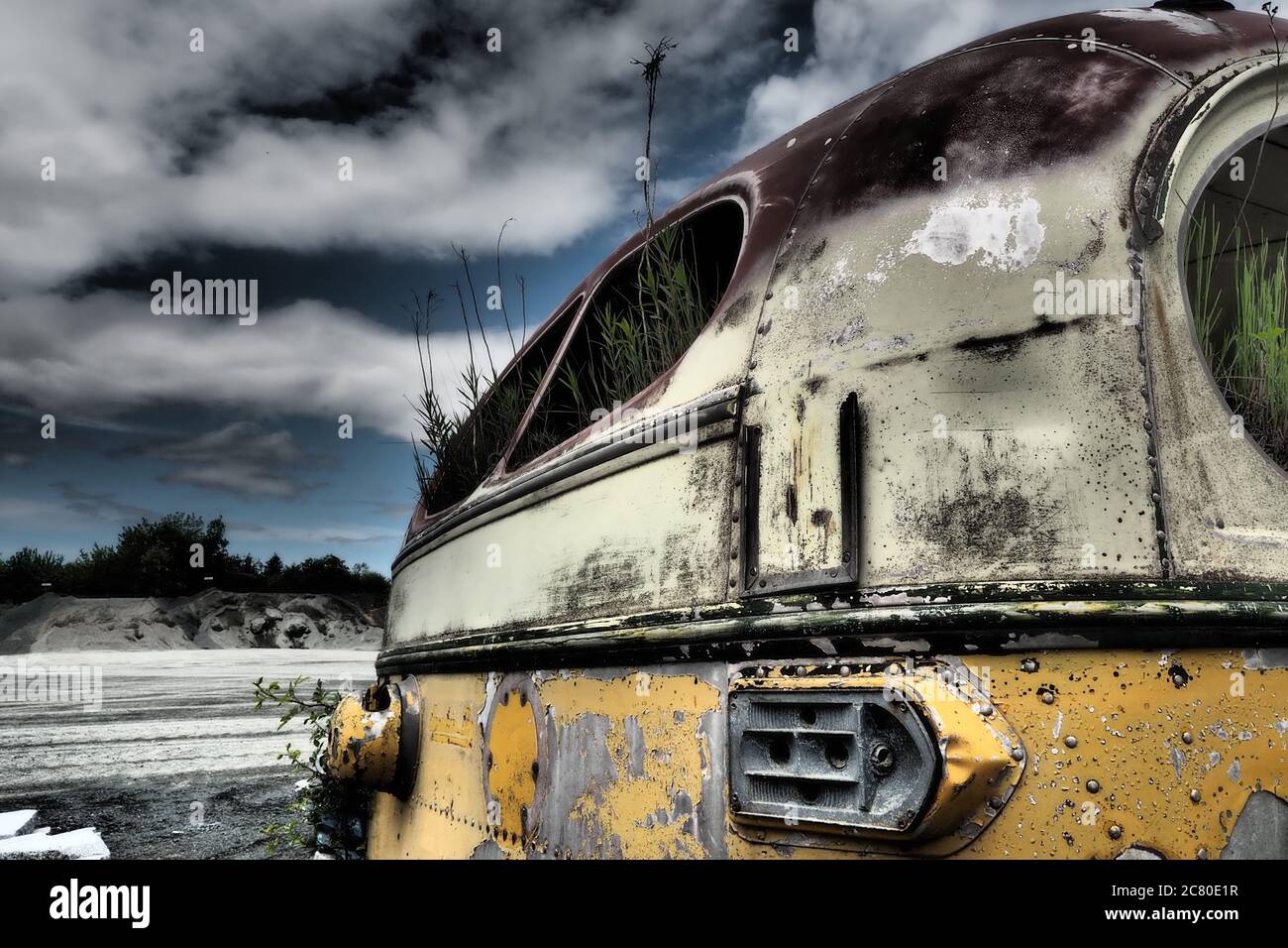 Old and abandoned bus in a field captured during the daytime Stock ...
