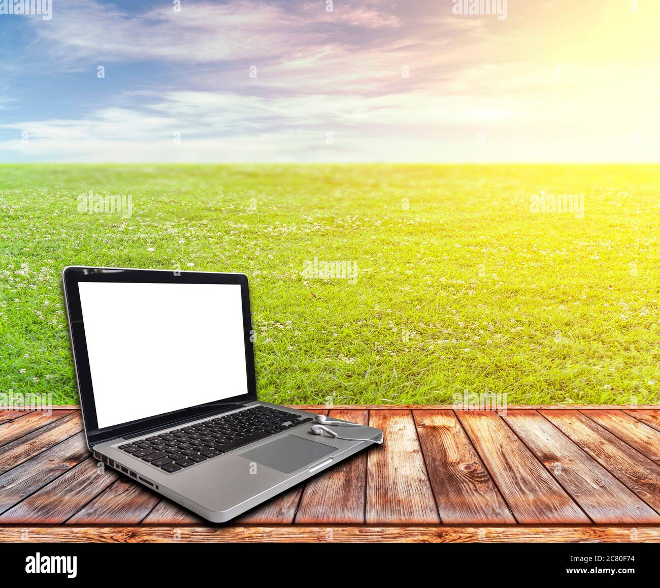 Wooden terrace with PC and lawn Stock Photo - Alamy