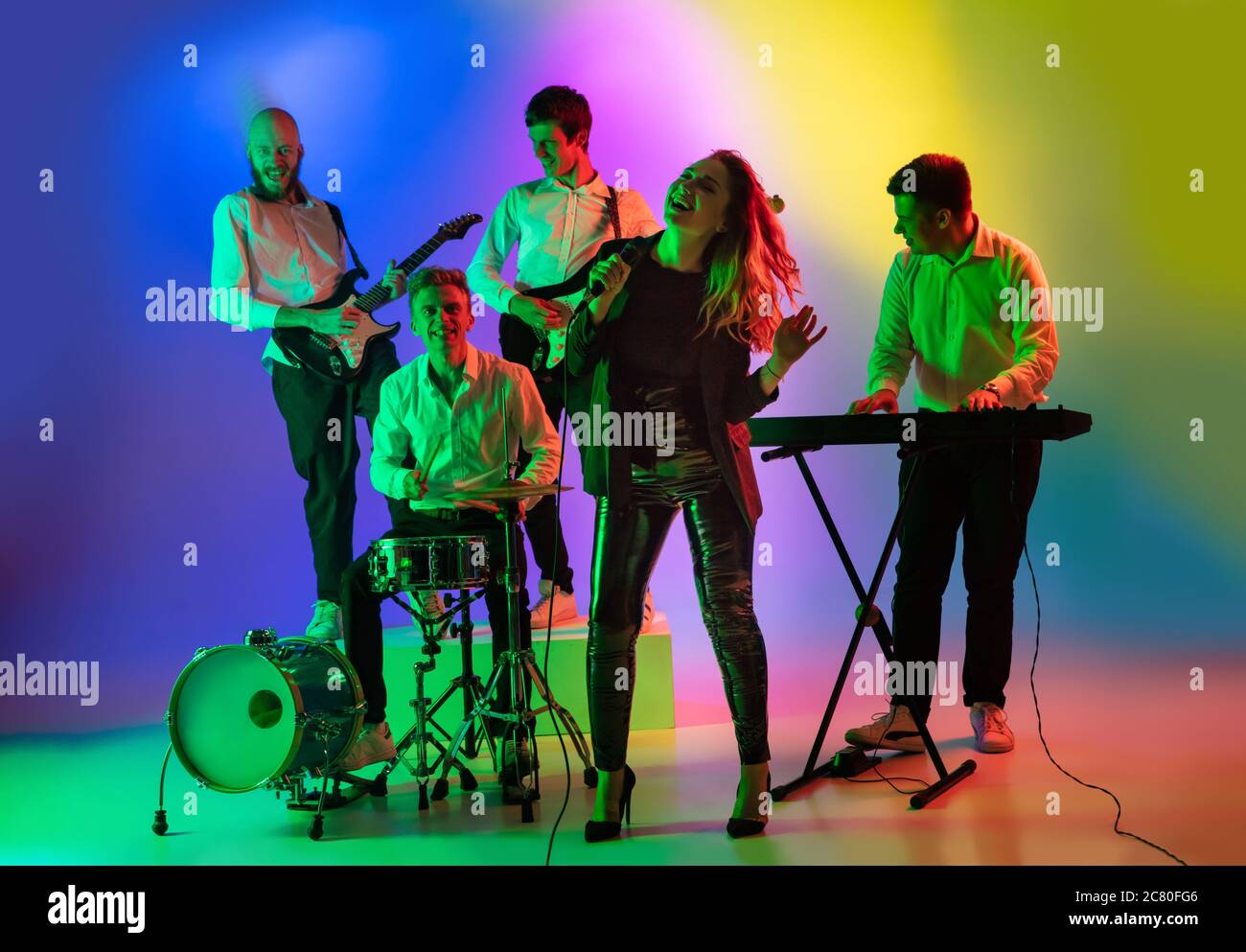 Motion. Young caucasian inspired and expressive musicians, band ...