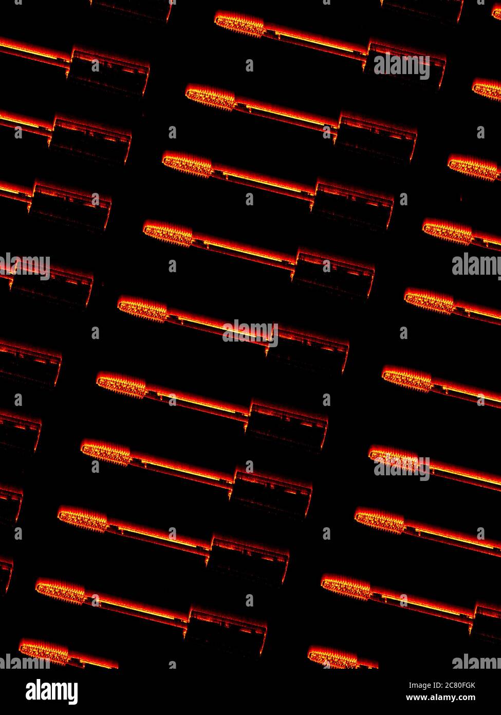 Brush rimmel pattern on fire on black background Stock Photo - Alamy