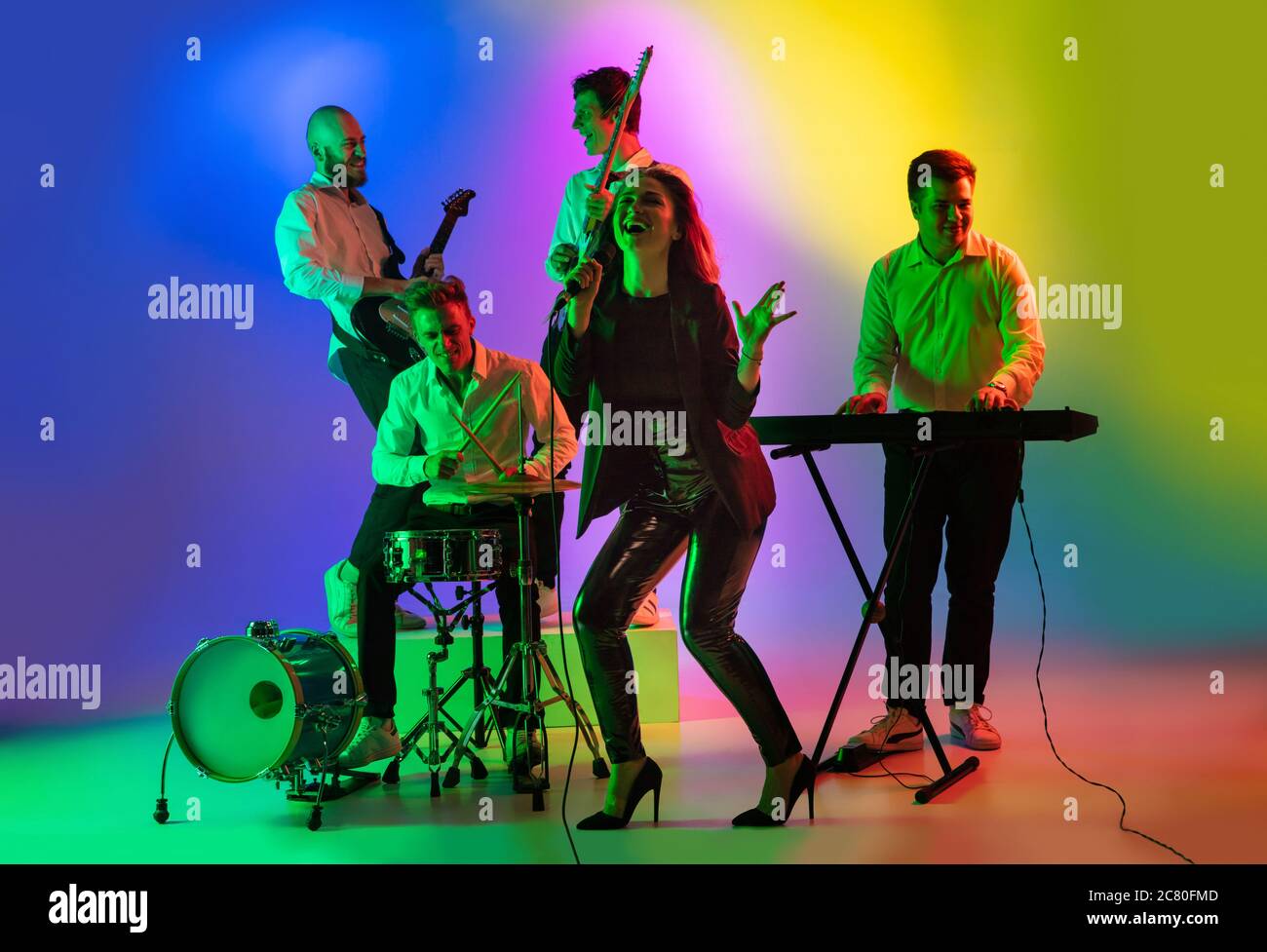 Motion. Young caucasian inspired and expressive musicians, band ...